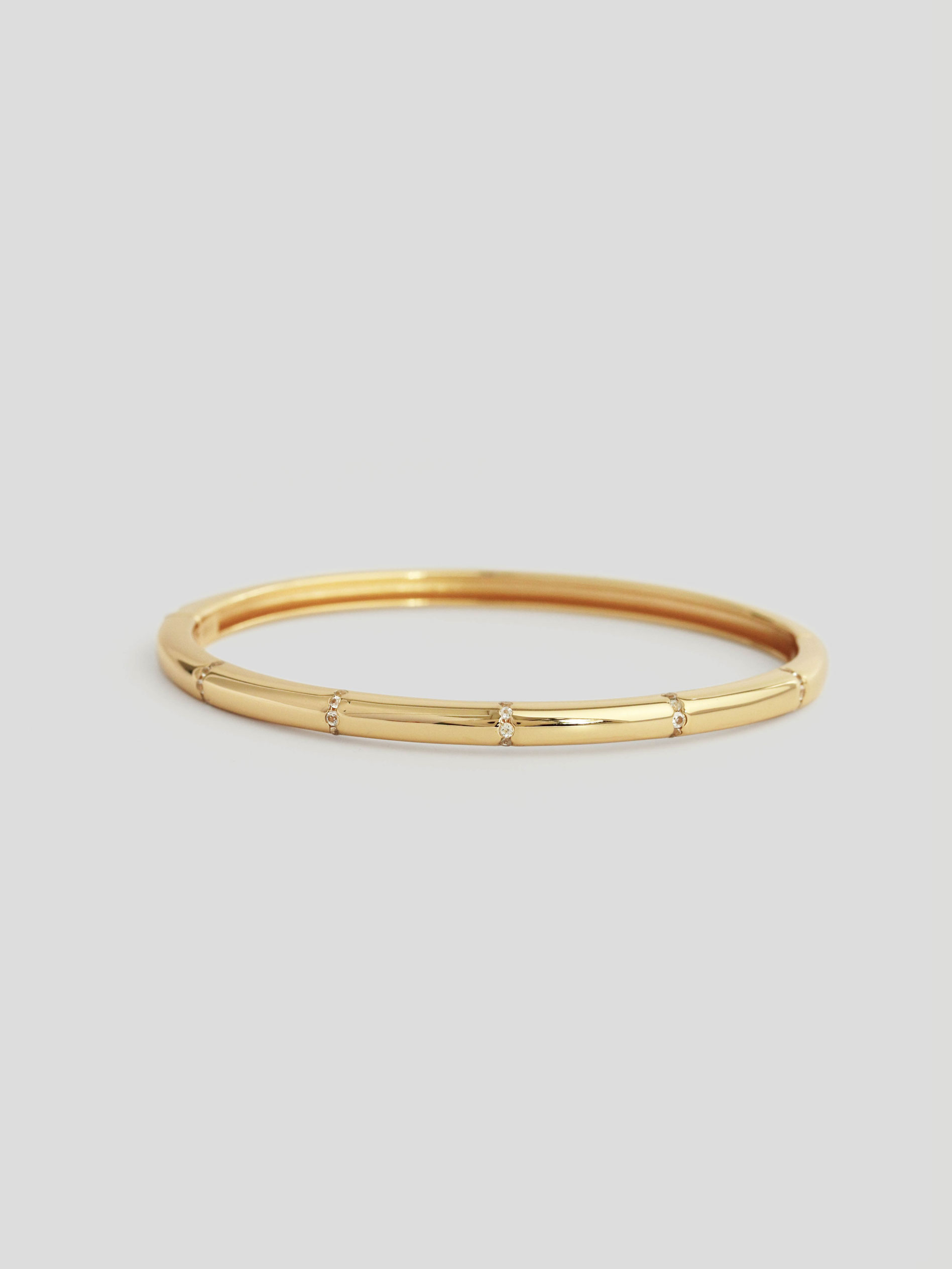 Twilight Bangle - White Topaz in Champagne Gold | Curious Creatures
