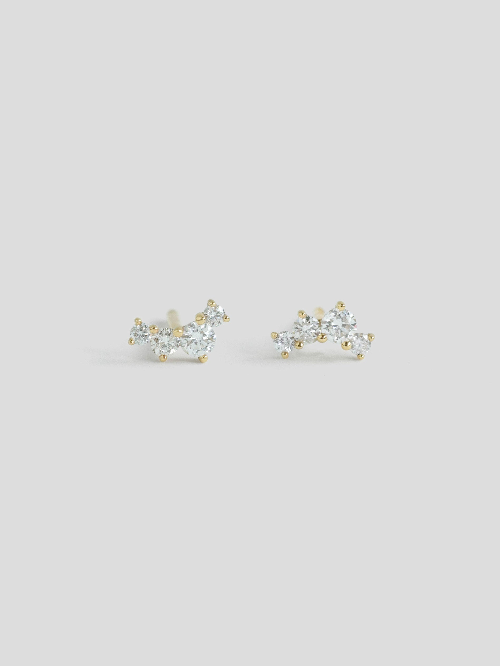 14k gold star dust ear studs with diamonds