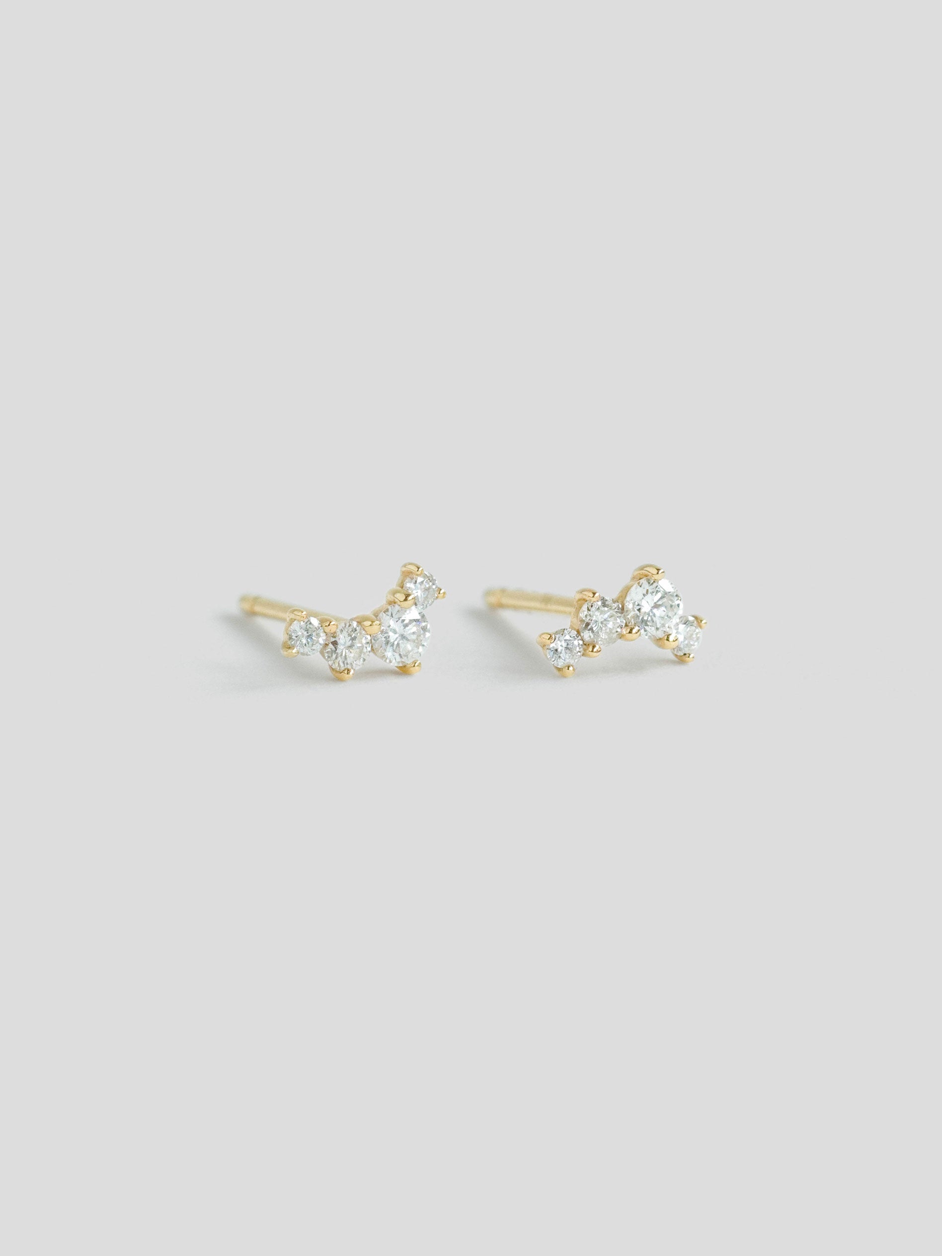 14k gold star dust ear studs with diamonds