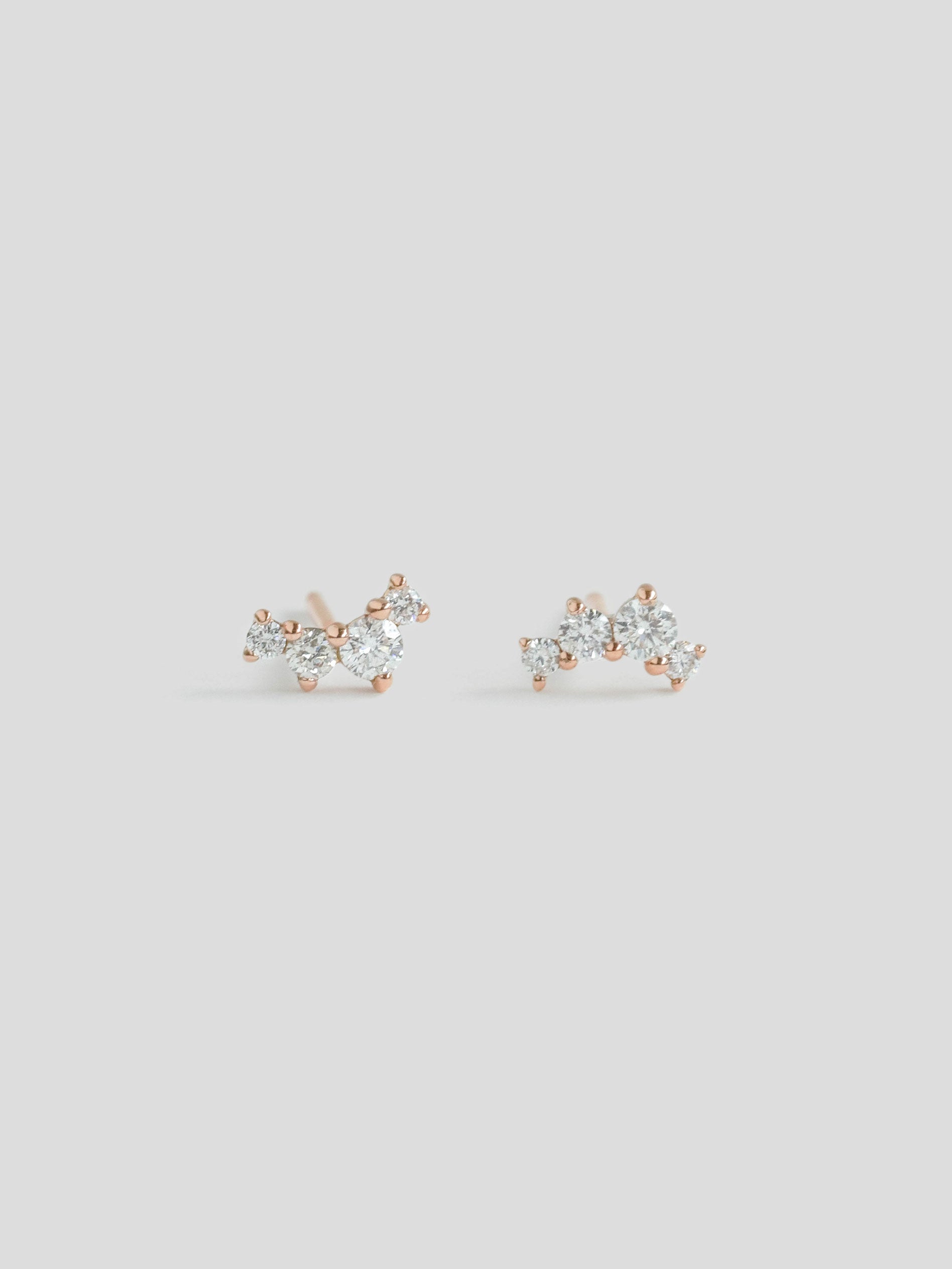 14k rose gold star dust ear studs with diamonds